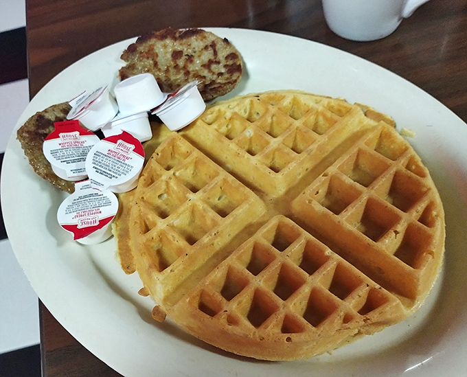 Golden perfection in waffle form&mdash;those deep squares aren't just for show, they're strategic syrup reservoirs designed by breakfast engineers.