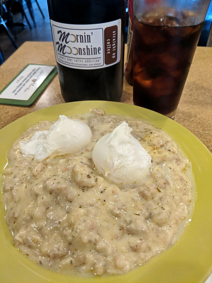 Comfort in a bowl&mdash;creamy biscuits and gravy topped with poached eggs that break open like sunrise, paired with their signature Mornin' Moonshine coffee.