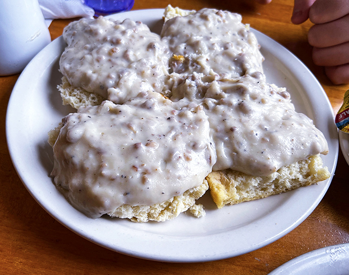 Behold the star attraction: biscuits smothered in sausage gravy so good you'll contemplate licking the plate. Diet culture's kryptonite, comfort food's superhero.