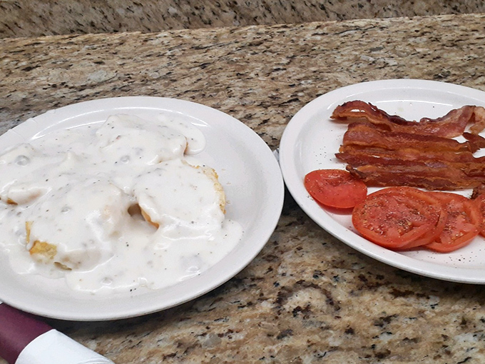 Biscuits and gravy that could make a Southern grandmother weep with joy, alongside bacon cooked to that perfect point between chewy and crisp.