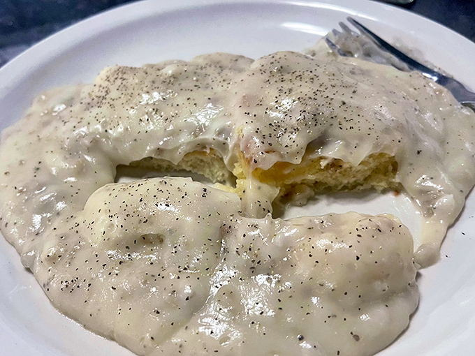 Behold the legendary biscuits and gravy &ndash; a velvety river of peppery sausage gravy cascading over golden biscuits. This isn't breakfast; it's an edible hug for your soul.