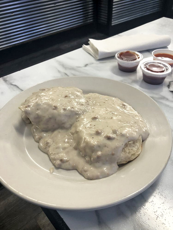 Behold the star attraction! These biscuits and gravy aren't just a meal; they're a religious experience worth crossing county lines for.