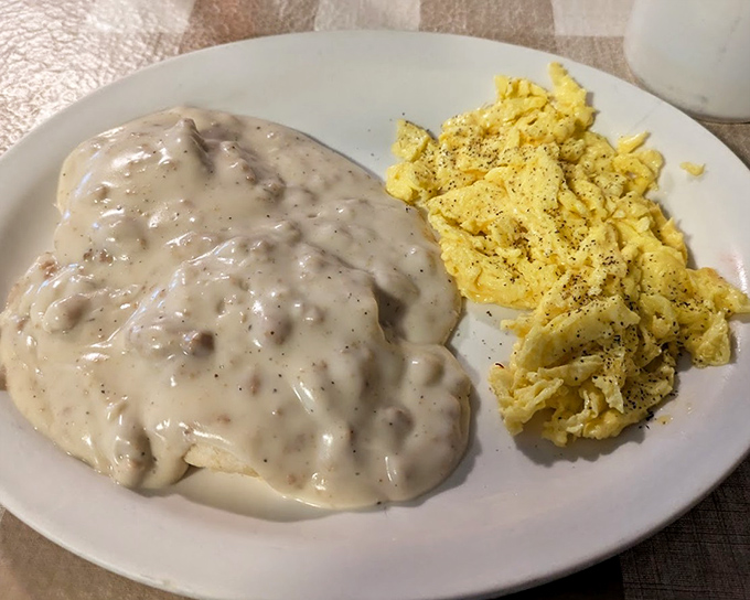 Behold the star attraction: biscuits drowning happily in peppery sausage gravy alongside scrambled eggs. Breakfast nirvana doesn't need to be complicated.