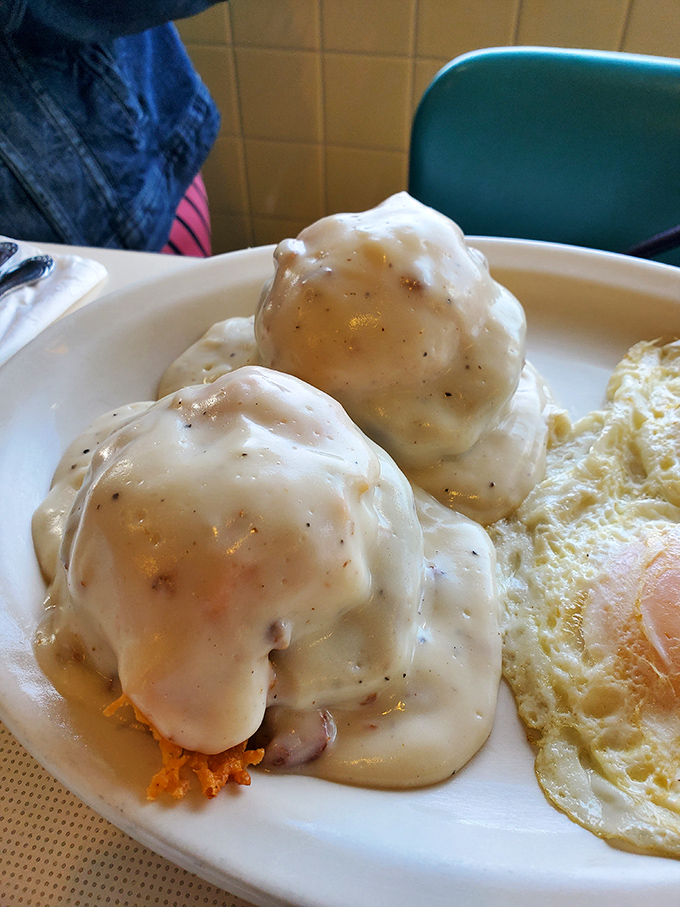 These biscuits and gravy aren't just breakfast&mdash;they're an edible hug. Fluffy clouds of dough swimming in peppery cream gravy that would make your grandma jealous.