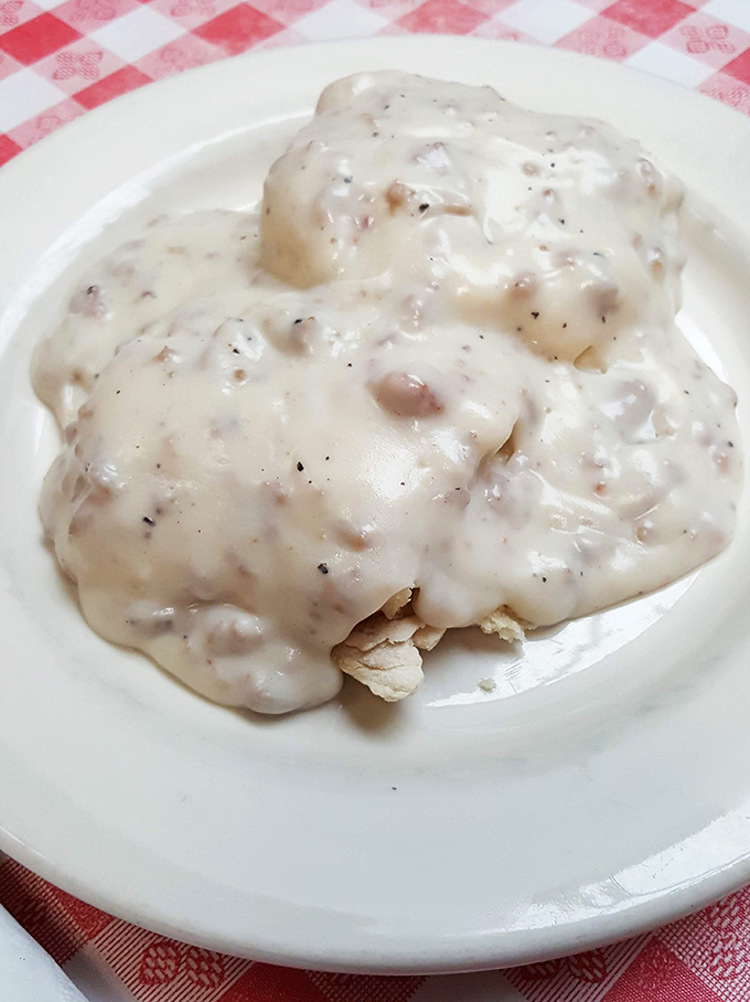 Behold the star attraction: biscuits smothered in creamy sausage gravy so good it might make your grandma slightly jealous of their recipe.