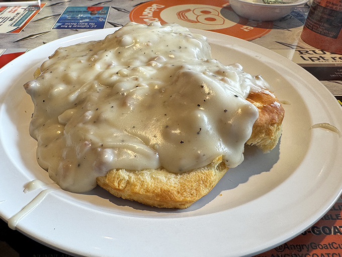 This biscuit and gravy situation could make a cardiologist weep tears of conflicted joy.