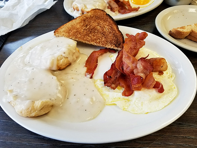 Biscuits swimming in creamy gravy alongside perfectly cooked eggs and bacon &ndash; the breakfast equivalent of hitting all green lights on your morning commute.