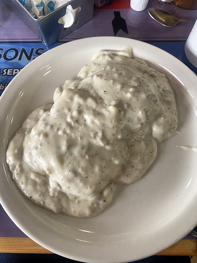 Behold the holy grail of Southern comfort: biscuits smothered in pepper-flecked sausage gravy. Not diet food, but worth every glorious calorie.