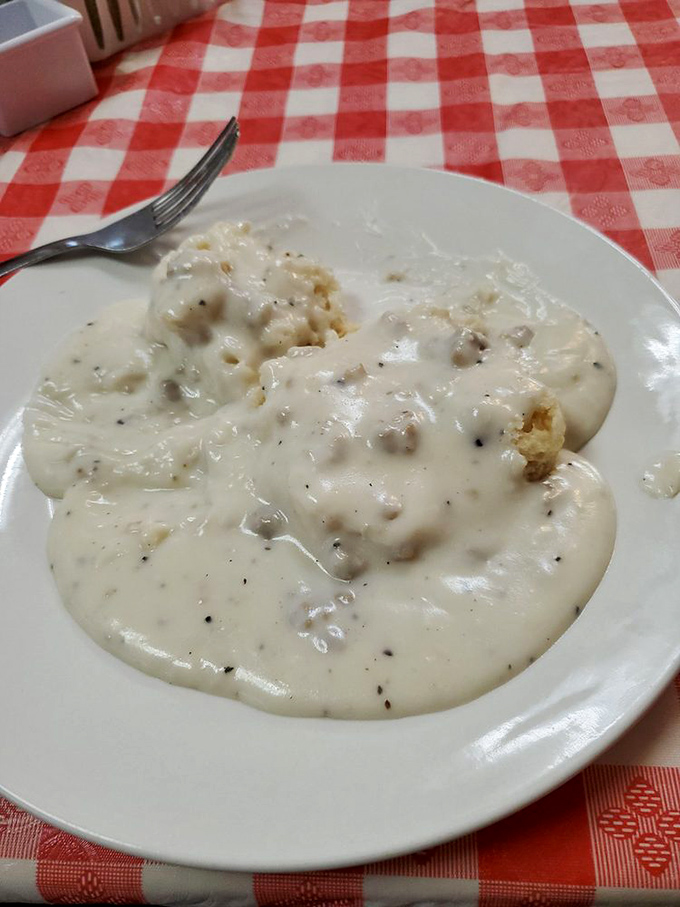 Behold, the holy grail of comfort food! These biscuits and gravy aren't just a meal&mdash;they're a warm, peppery hug on a plate.
