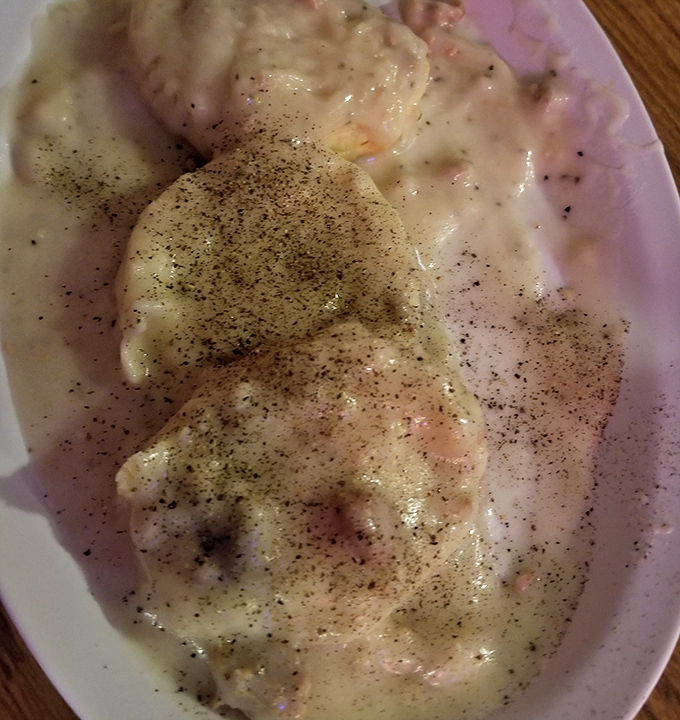 Biscuits and gravy so good they should require a permission slip. That pepper sprinkle isn't decoration&mdash;it's an exclamation point.