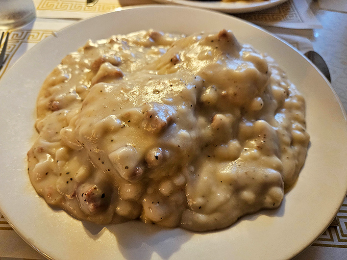 Behold the holy grail of comfort food: biscuits and gravy so rich and peppery, you'll consider moving next door just for easier access.