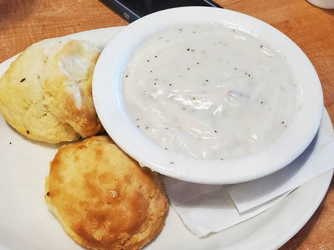 Behold, the star of our show! These golden biscuits swimming in peppery sausage gravy aren't just breakfast&mdash;they're an edible hug that might just solve all your problems.