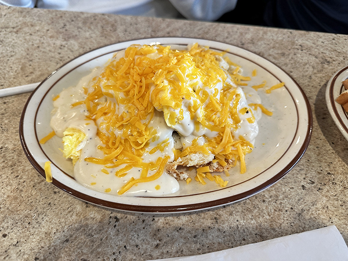 Biscuits and gravy that would make your grandmother both proud and jealous. That melted cheese crown turns breakfast into coronation ceremony for your taste buds.