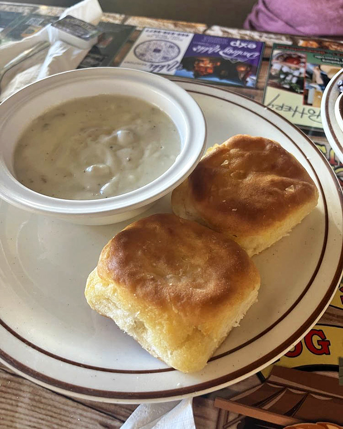 Behold the stars of our show! These golden biscuits with creamy sausage gravy aren't just breakfast&mdash;they're an edible love letter to Southern cooking traditions.