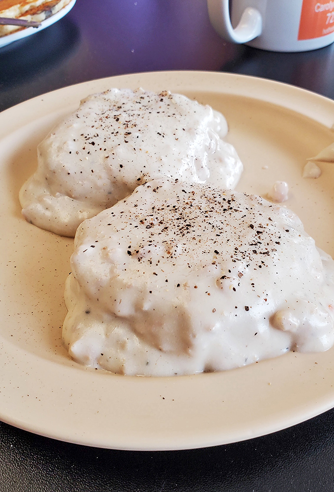 These biscuits and gravy aren't trying to reinvent the wheel, they're just making sure it rolls perfectly with every creamy, peppery bite.