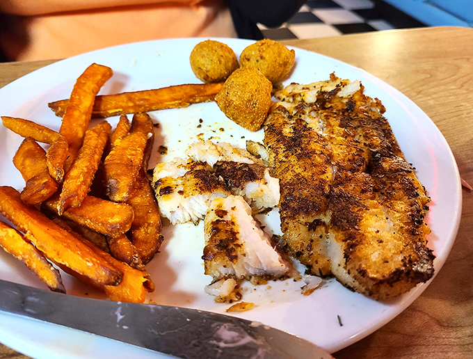 Blackened catfish that's crispy where it should be crispy, tender where it should be tender, and seasoned like it was kissed by the flavor gods.