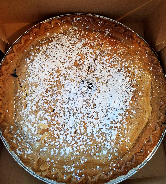 Behold the powdered sugar-dusted masterpiece that launches a thousand detours to Deale. This pie doesn't just satisfy cravings&mdash;it creates devotees.