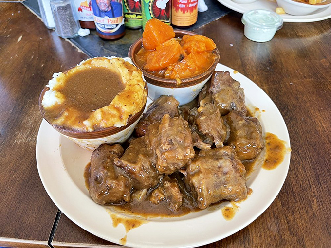 Behold the star of the show: oxtail so tender it practically surrenders to your fork, swimming in a sauce that deserves its own fan club.