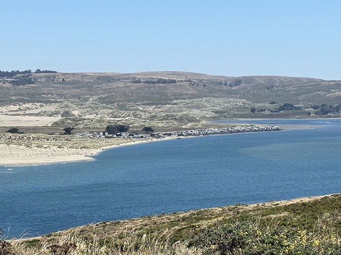 Brazil Beach hides just south, because even beaches need a quiet neighbor to borrow sugar from.