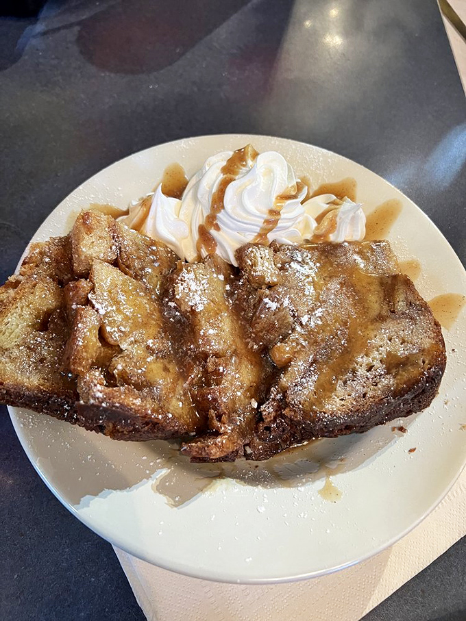 This bread pudding isn't just dessert; it's a religious experience. Warm, custardy perfection topped with bourbon sauce that would make angels weep.