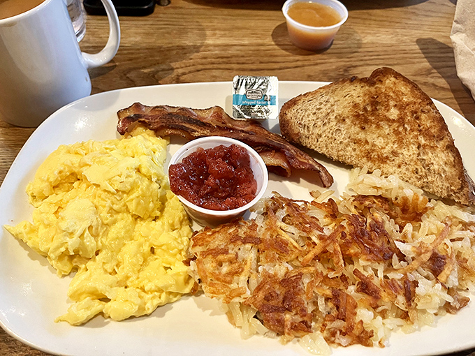 Breakfast perfection doesn't need fancy frills&mdash;just fluffy scrambled eggs, crispy hash browns, and bacon that makes you question all other bacon you've ever known.