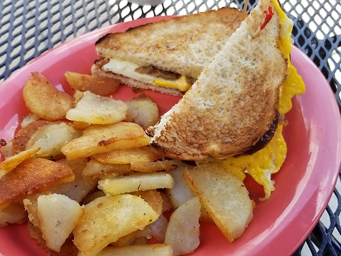 Breakfast sandwiches that make you question why we don't eat them for every meal, paired with home fries that could convert a potato skeptic.