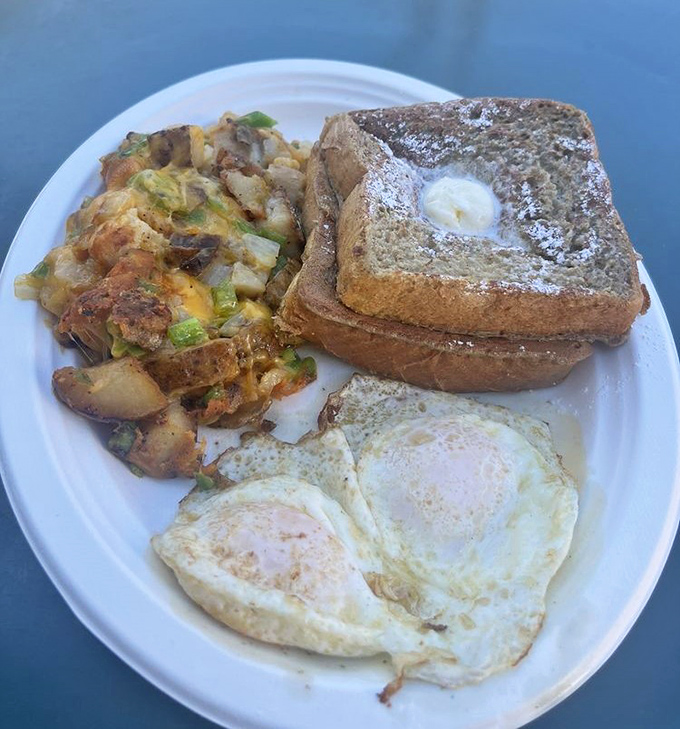 French toast dusted with powdered sugar alongside those famous Kono's potatoes. Breakfast nirvana achieved without a single meditation app.