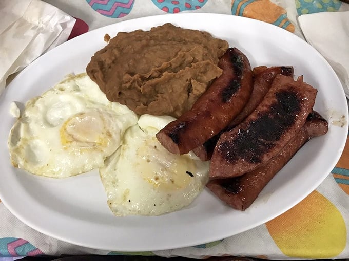 Eggs, refried beans, and sausage: the holy trinity of breakfast that says, "Go ahead, take that nap later. You've earned it."