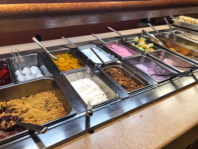 The breakfast buffet station&mdash;where diet plans go to die and memories are born. That crumble topping alone deserves its own zip code.