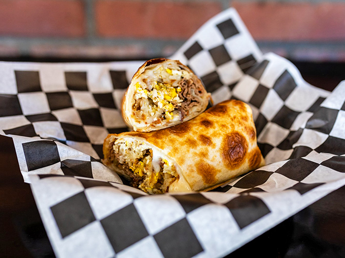 This breakfast burrito isn't just a meal, it's a morning revelation wrapped in a tortilla. The perfect balance of eggs, potatoes, and cheese that makes alarm clocks worthwhile.