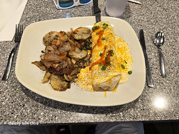 A perfect marriage of fluffy eggs and crispy potatoes that proves breakfast is the most important art form of the day.