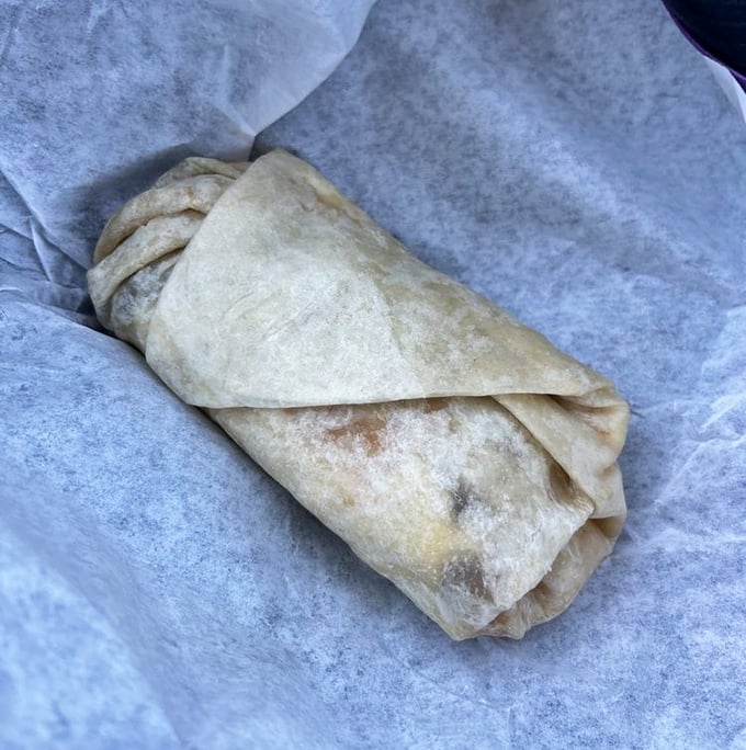 The legendary breakfast burrito in its natural habitat &ndash; perfectly wrapped, slightly toasted, and ready to cure whatever ails you.