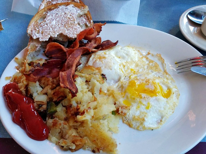 Breakfast perfection doesn't need fancy plating&mdash;just perfectly crispy home fries, eggs with that sunset-yellow yolk, and bacon that shatters like glass.