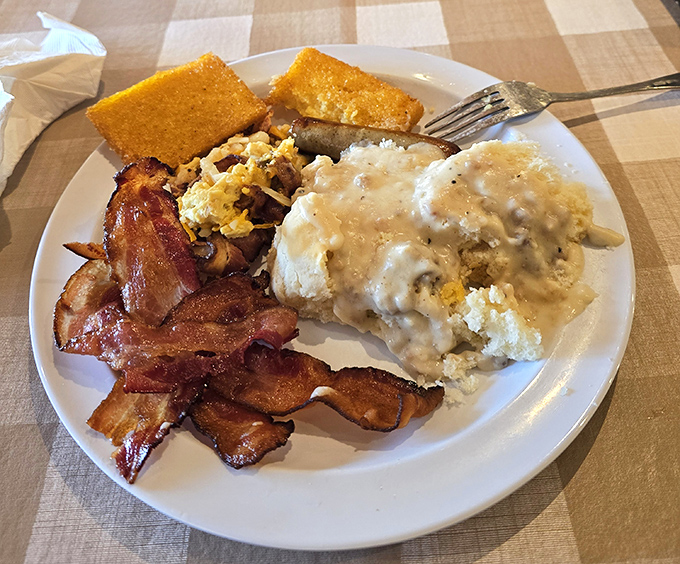Breakfast of champions! Biscuits and gravy, bacon, and cornbread that would make your grandmother both proud and jealous at the same time.