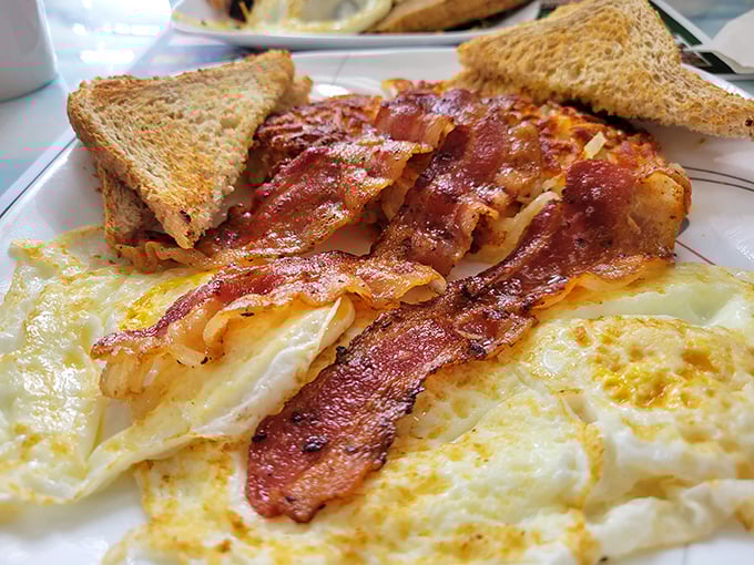 Breakfast perfection doesn't need to be complicated. Crispy bacon, perfectly cooked eggs, and toast that's actually buttered to the edges. Revolutionary!