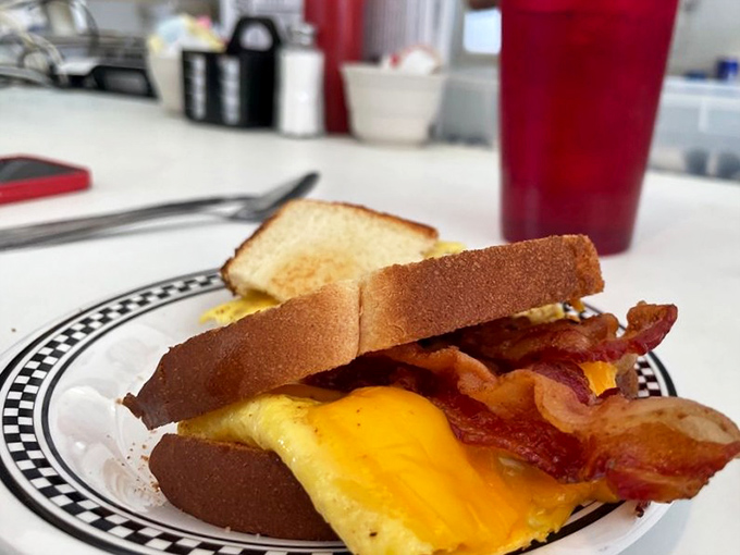 Behold the breakfast sandwich in its natural habitat&mdash;where melted cheese meets perfectly cooked eggs and bacon in holy matrimony.