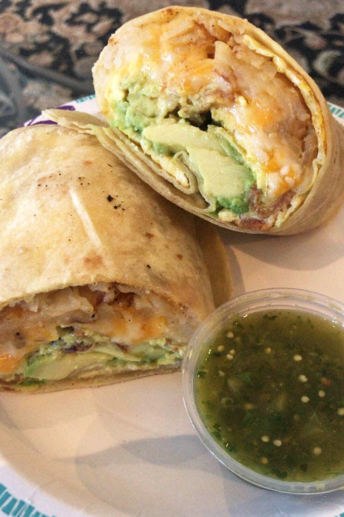 Behold the breakfast burrito that launches a thousand road trips, perfectly wrapped and bursting with golden goodness.