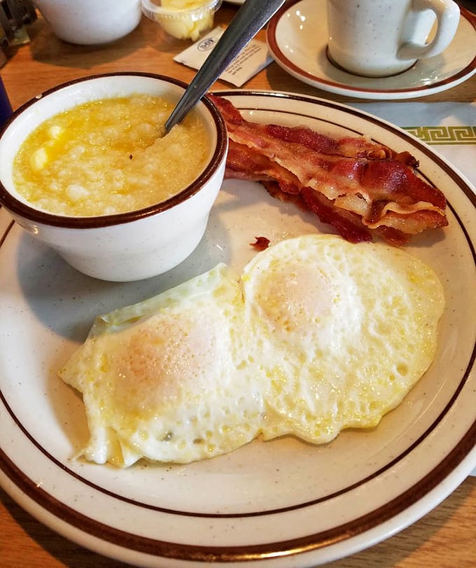 Two eggs, crispy bacon, and grits that could make a Southerner weep with joy.
