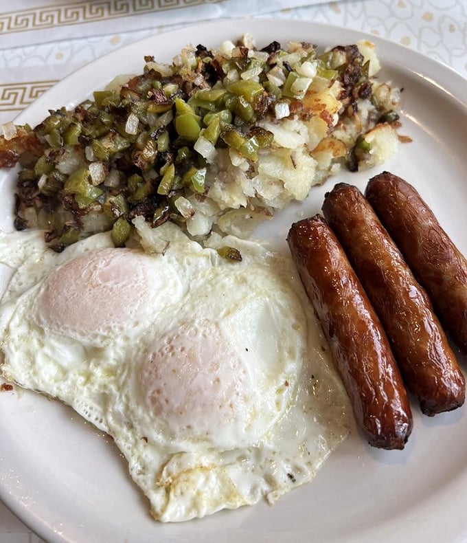 Breakfast perfection on a plate. Those hash browns with green peppers could make a morning person out of even the grumpiest night owl.