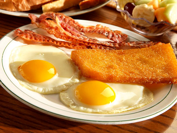 Two eggs, crispy bacon, and golden hash browns &ndash; the holy trinity of morning happiness.