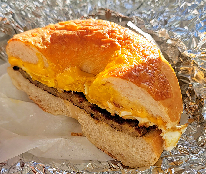 This breakfast sandwich isn't just food&mdash;it's morning salvation wrapped in foil, with melted cheese cascading over perfectly seasoned meat.