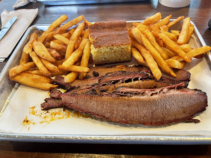 Behold the brisket in all its bark-crusted glory. That smoke ring isn't just pink&mdash;it's a halo signifying barbecue divinity.