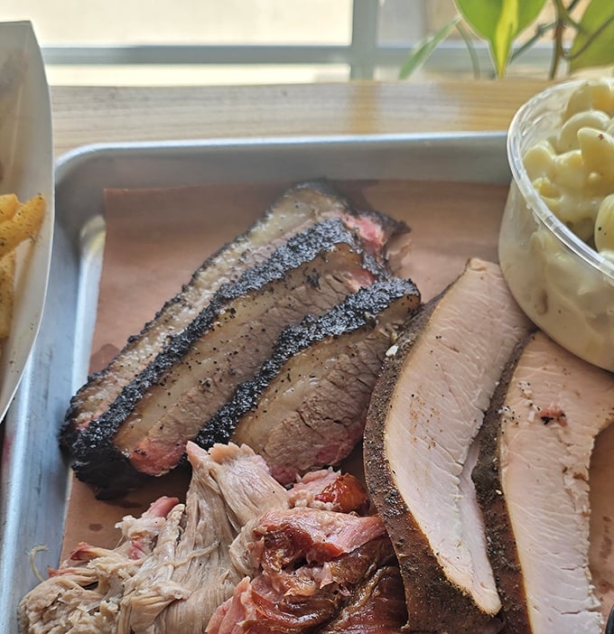That perfect smoke ring tells the whole story &ndash; hours of patient smoking transformed into pure brisket bliss.