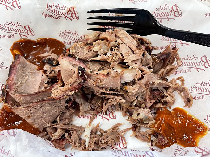 Behold, the brisket in all its glory. Each tender morsel tells a story of patience, smoke, and barbecue mastery.