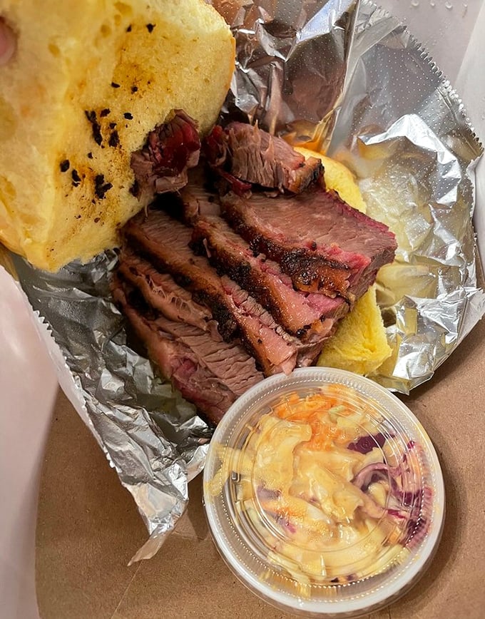 This brisket sandwich arrives wrapped like a gift, because that's essentially what it is to your taste buds.