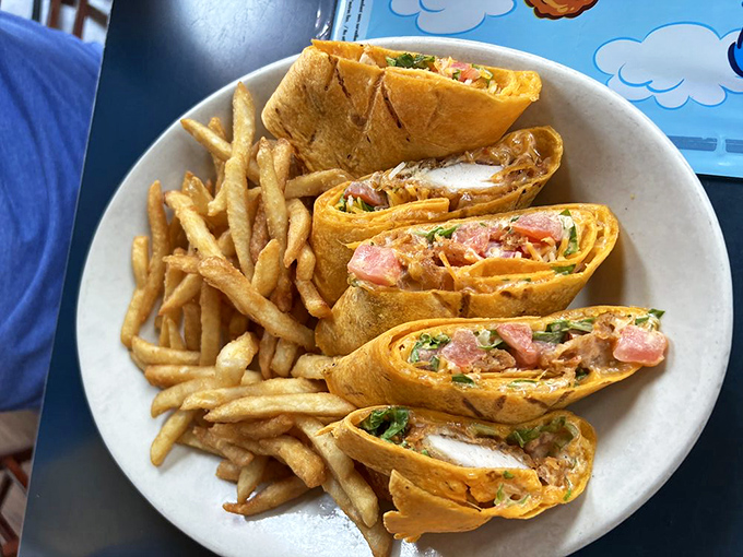 The star of the show: Fitz's Buffalo Chicken Wrap, where crispy chicken, tangy buffalo sauce, and cool ranch create a flavor trifecta that'll make your taste buds high-five each other.