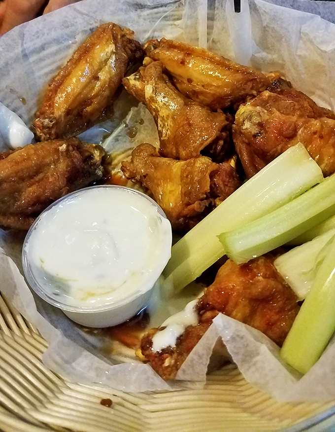 Buffalo wings that would make Buffalo jealous. Crispy, saucy perfection served with the obligatory celery and blue cheese&mdash;a seafood joint's surprising superstar.