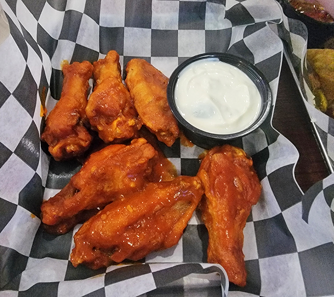 Buffalo wings that don't mess around&mdash;crispy, saucy, and unapologetically messy. Your shirt will remember this meal long after your stomach does.