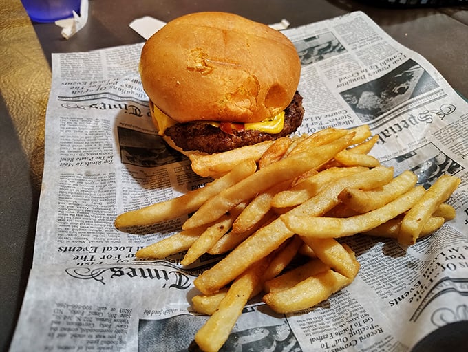 Sometimes the simplest pleasures deliver the greatest joy - a perfectly grilled burger with golden crispy fries.