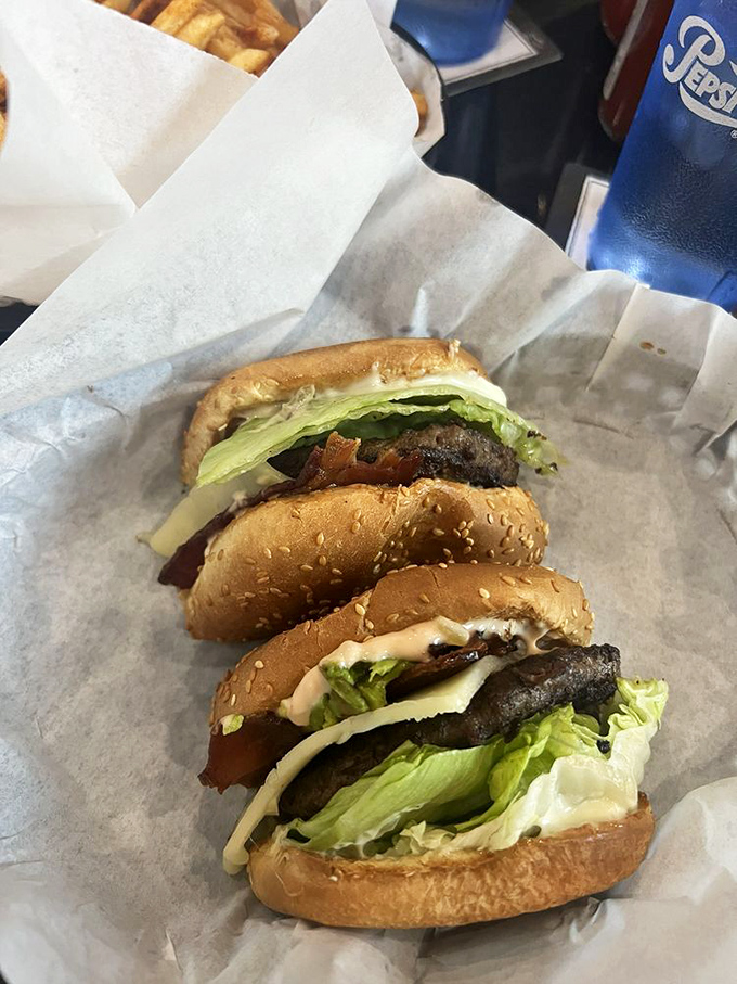 The ABC Burger arrives like edible architecture&mdash;perfectly charred patty, crisp bacon, and fresh avocado creating California's answer to burger perfection.